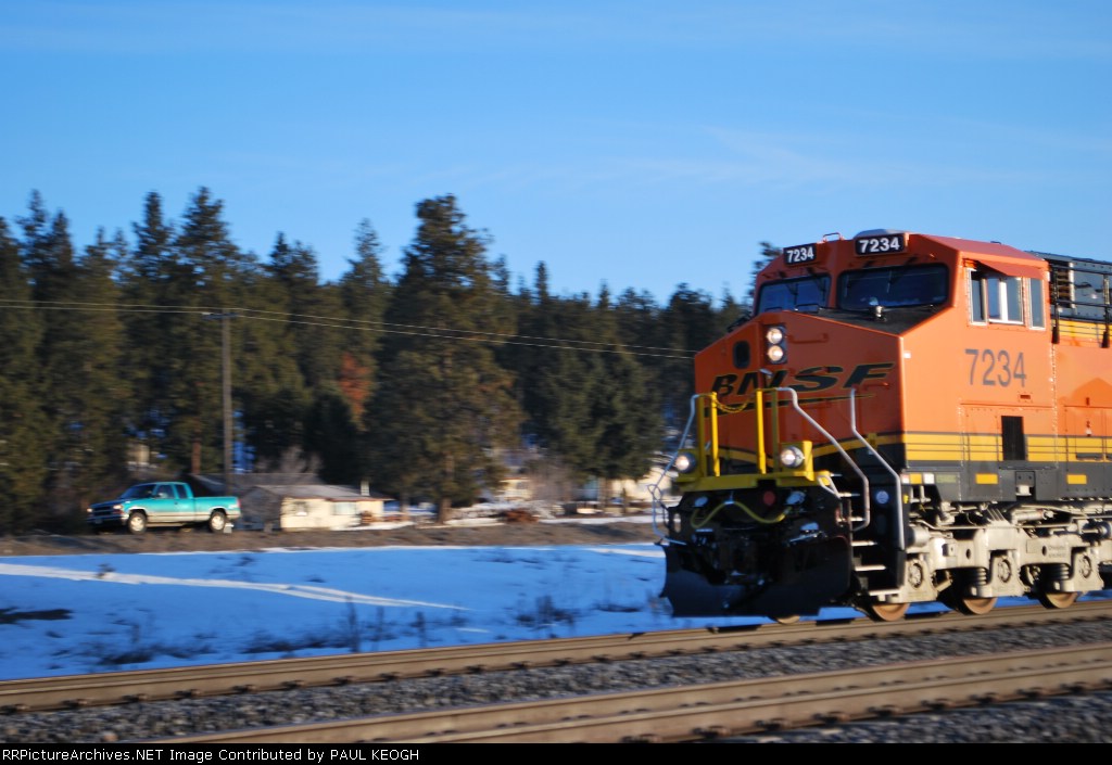 Really close up of a brand new BNSF 7234 as she rolls west with a hot Z.